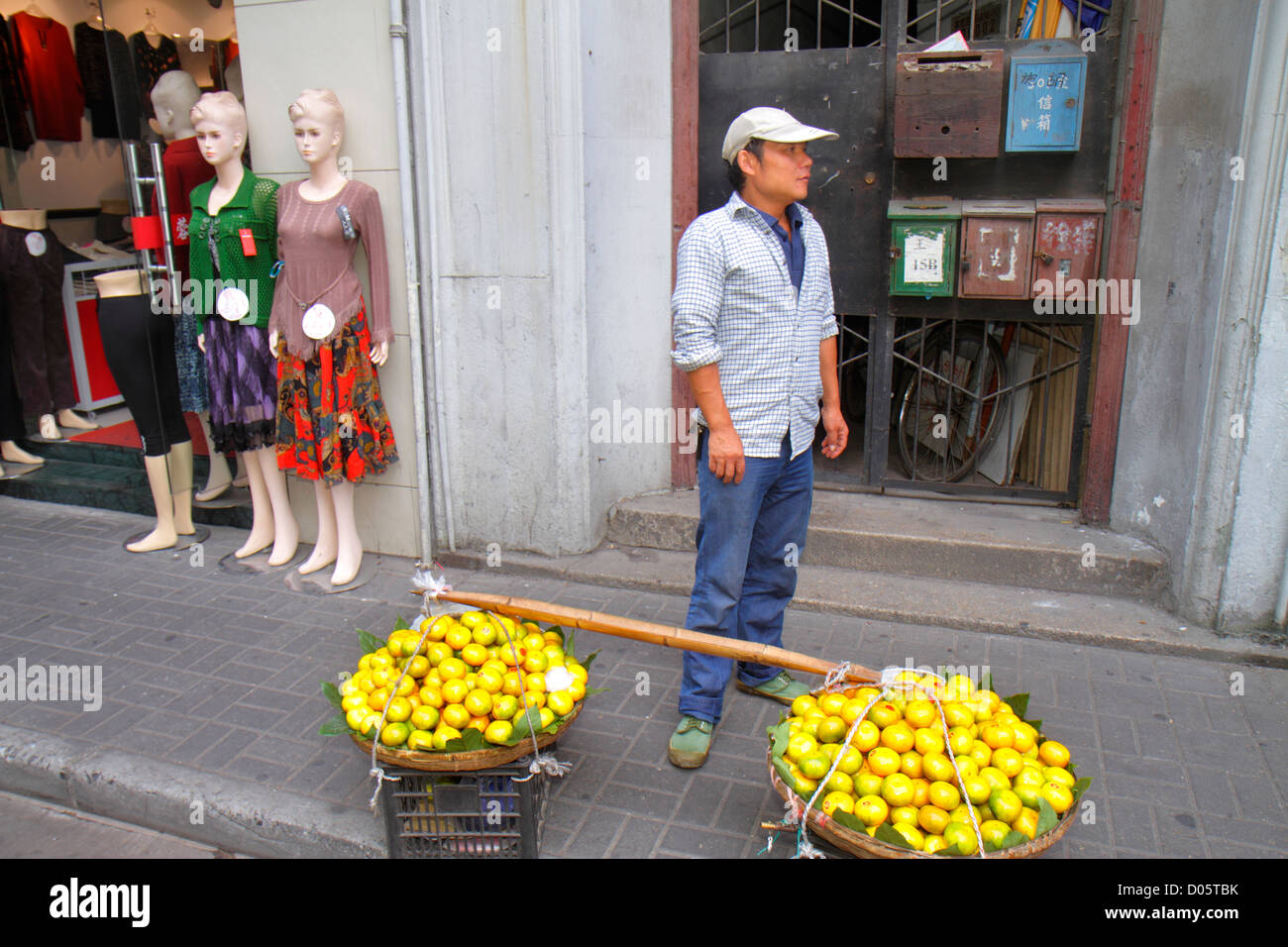 Shoulder Carrying Pole Stock Photos & Shoulder Carrying Pole Stock ...