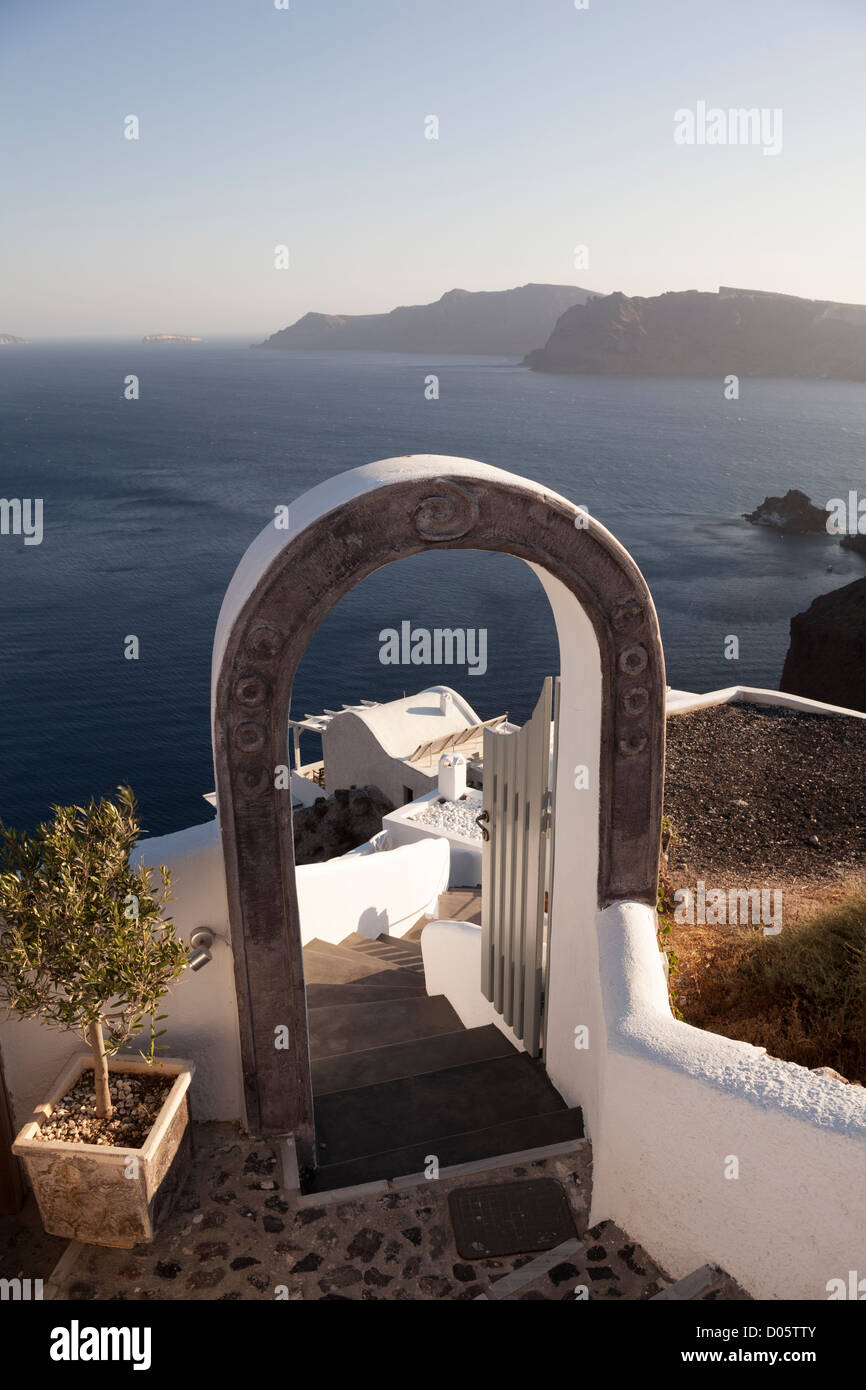 Stone arch and sea view, Oia village, Santorini island, Cyclades ...