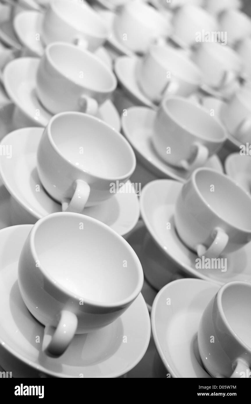 A collection of tea or coffee cups in rows Stock Photo - Alamy