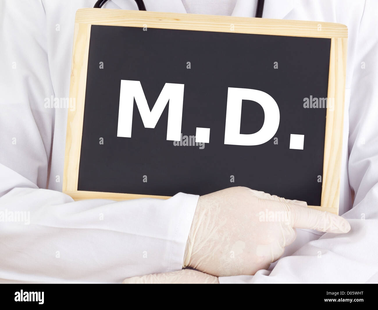 Doctor shows information on blackboard: doctor of medicine Stock Photo ...