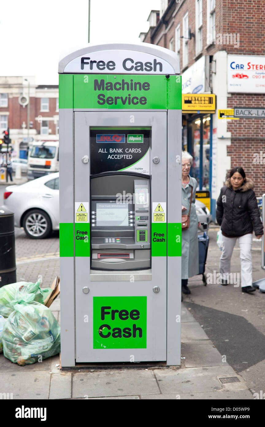 An isolated free cash machine on the pavement, Edgware, England, UK ...