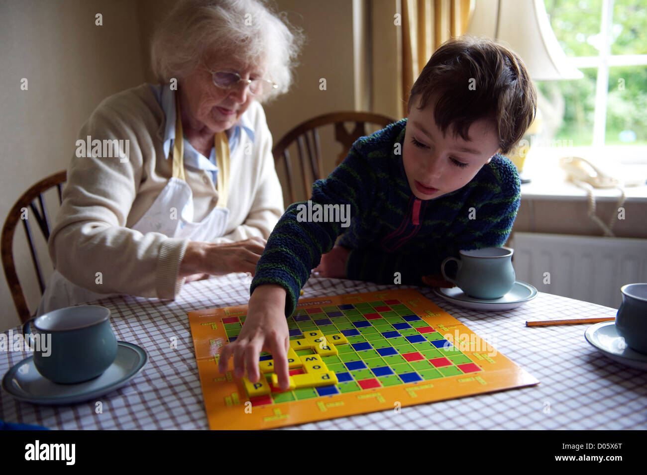 Family playing scrabble hi-res stock photography and images - Alamy