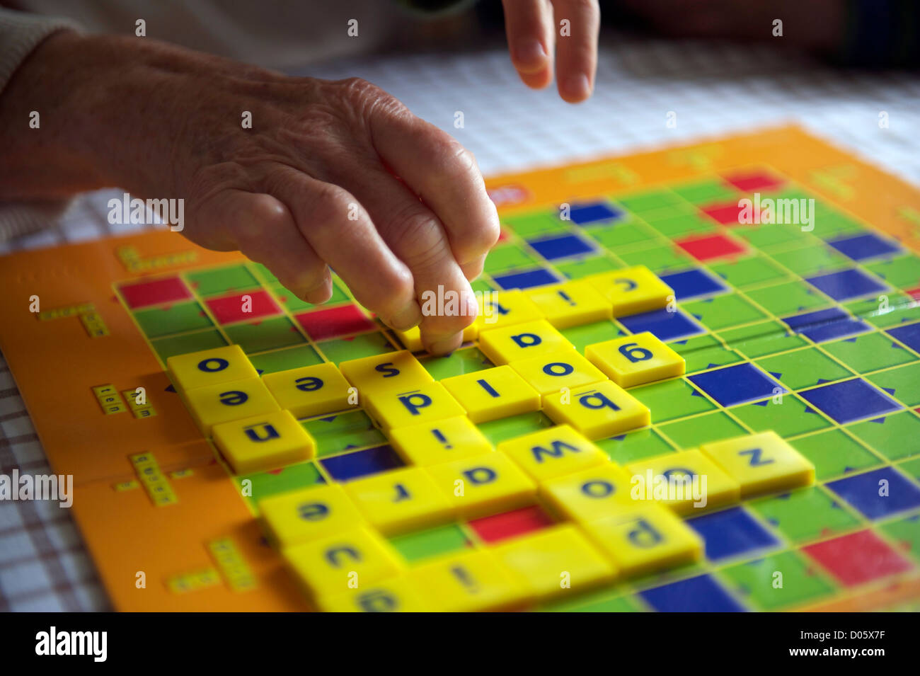 Family playing scrabble hi-res stock photography and images - Alamy