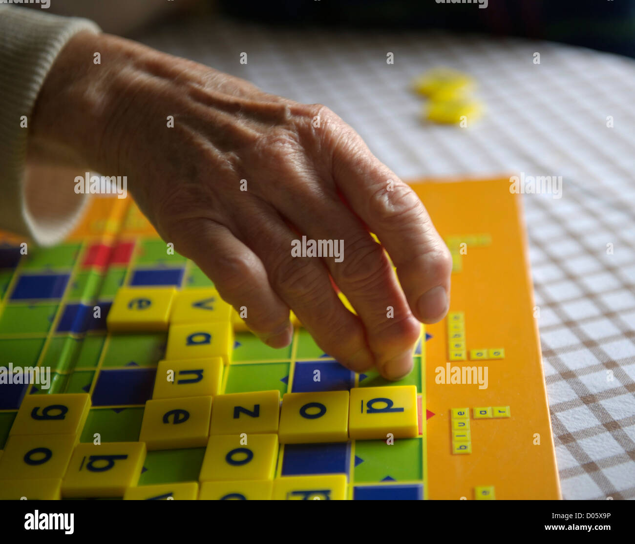 Family playing scrabble hi-res stock photography and images - Alamy