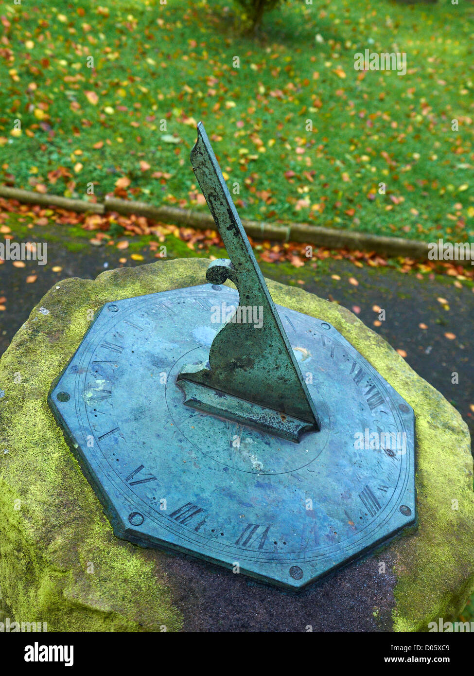 Old weathered sun dial Stock Photo - Alamy