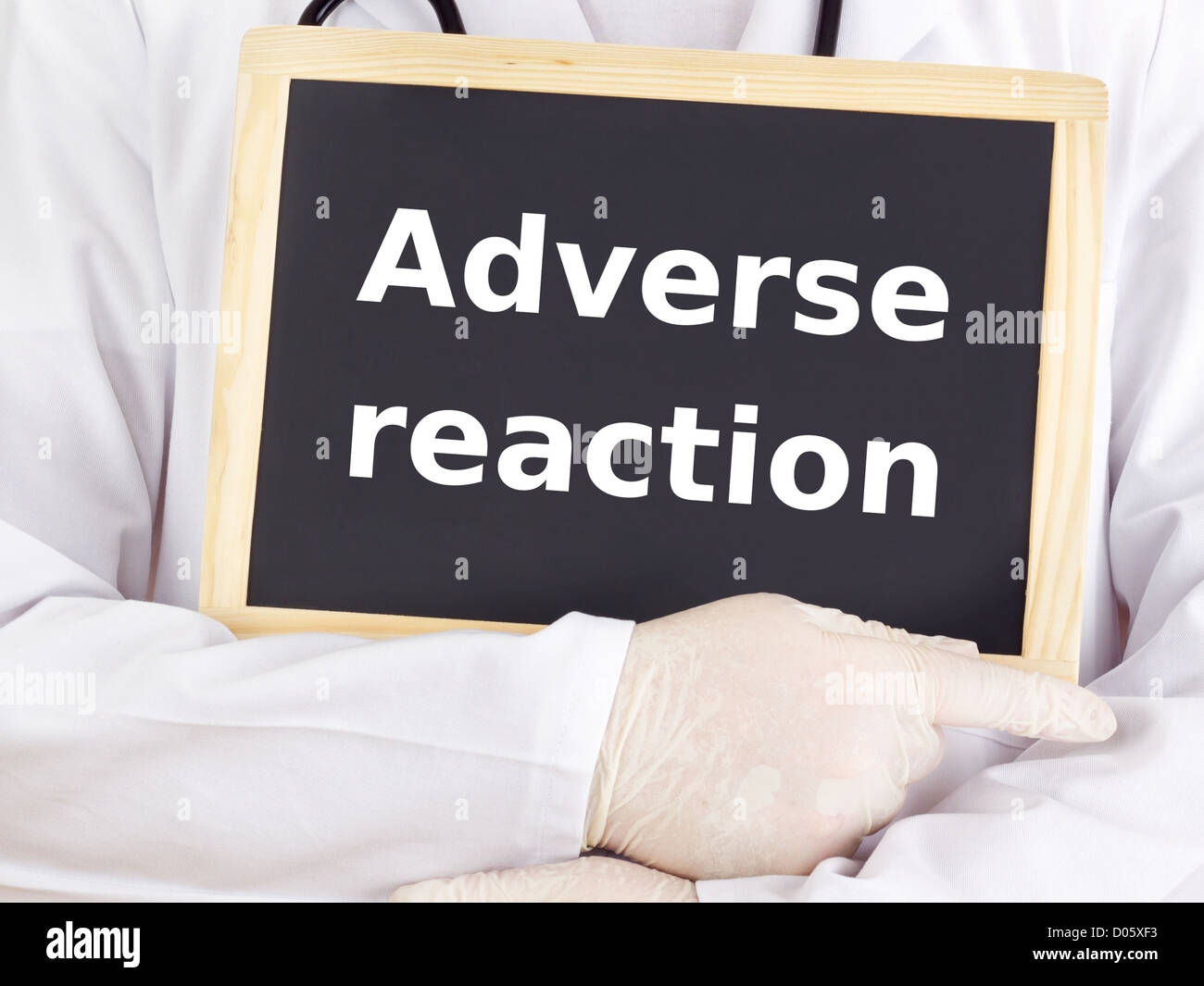 Doctor shows information on blackboard: adverse reaction Stock Photo ...