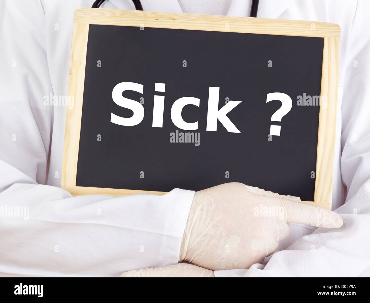 Doctor shows information on blackboard: sick Stock Photo - Alamy