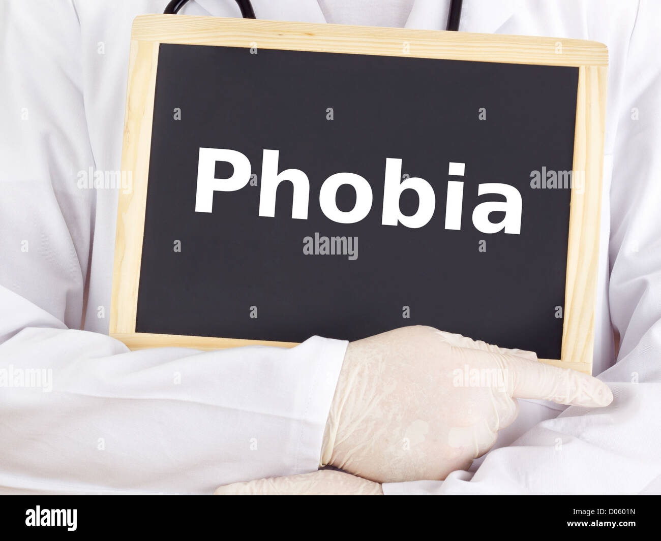 Doctor shows information on blackboard: phobia Stock Photo - Alamy