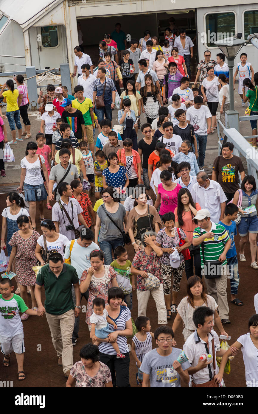 Crowds of people exiting a Huangpu River ferry Shanghai, China Stock ...