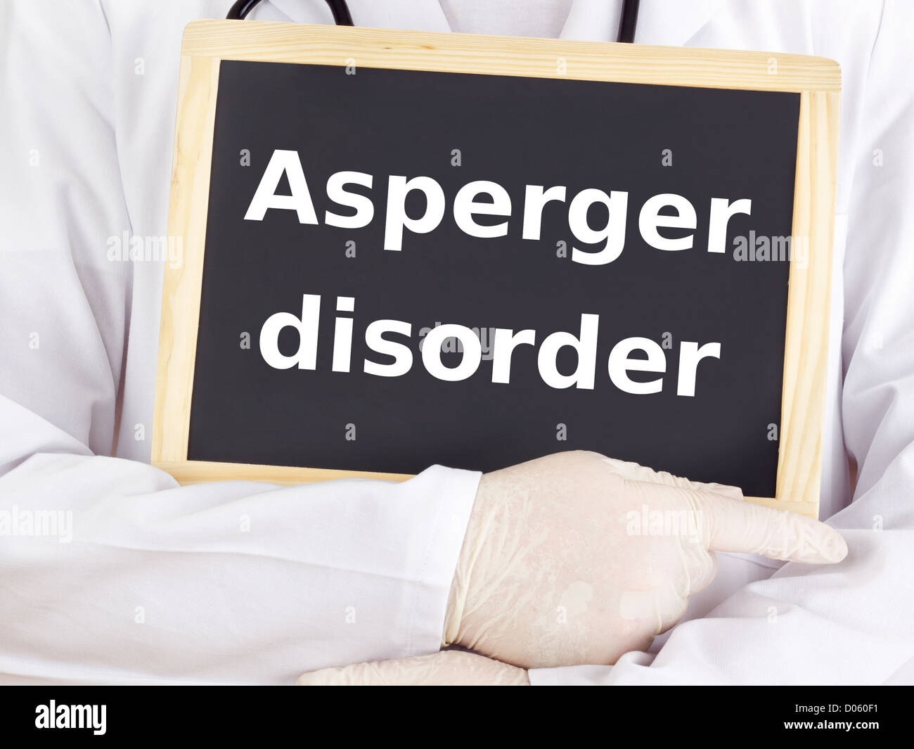 Doctor shows information: asperger disorder Stock Photo - Alamy