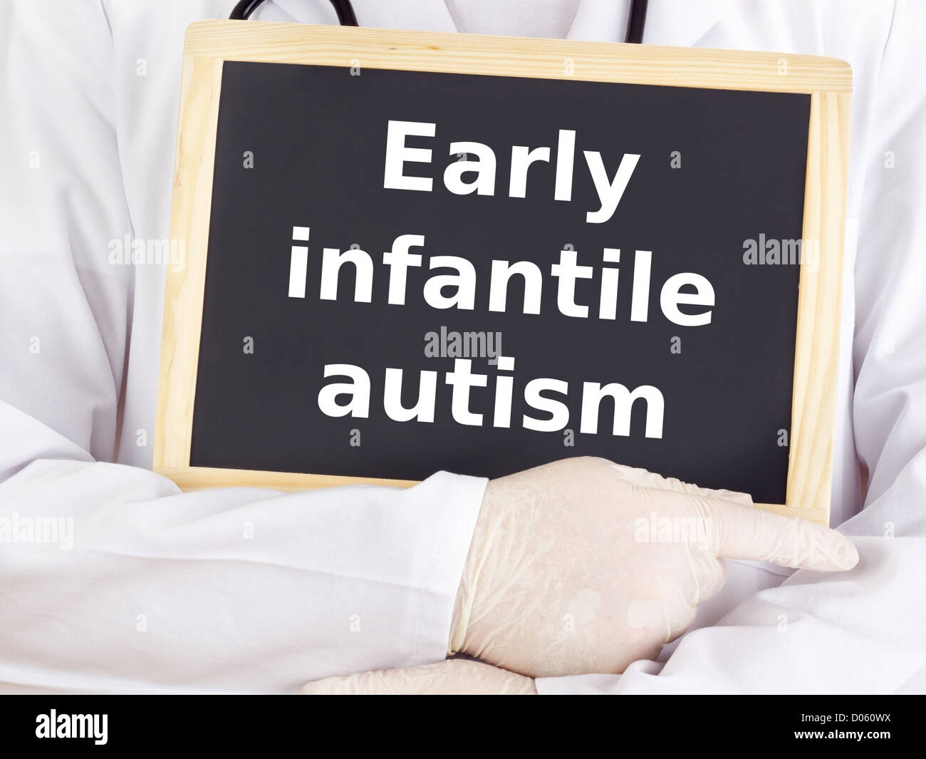Doctor shows information: early infantile autism Stock Photo - Alamy