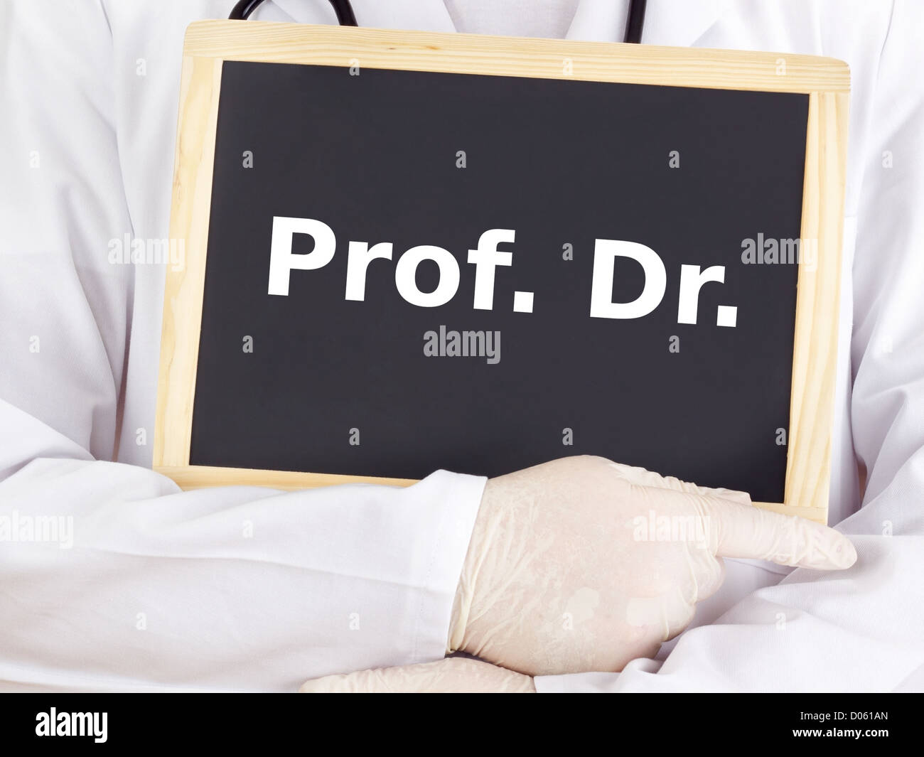 Doctor shows information on blackboard: prof. dr Stock Photo - Alamy