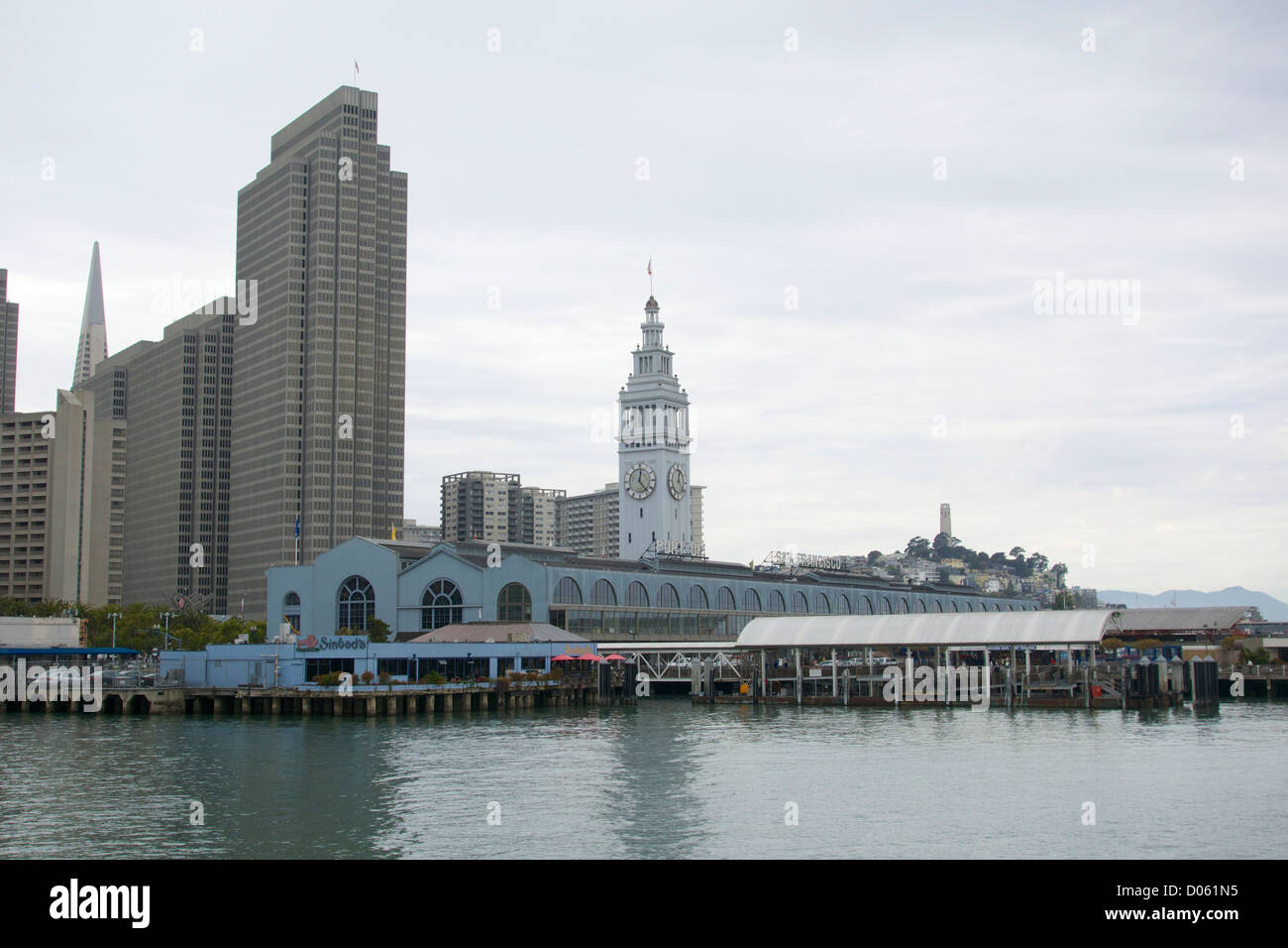 San Francisco Ferry Terminal Building, Coit Tower in background at ...