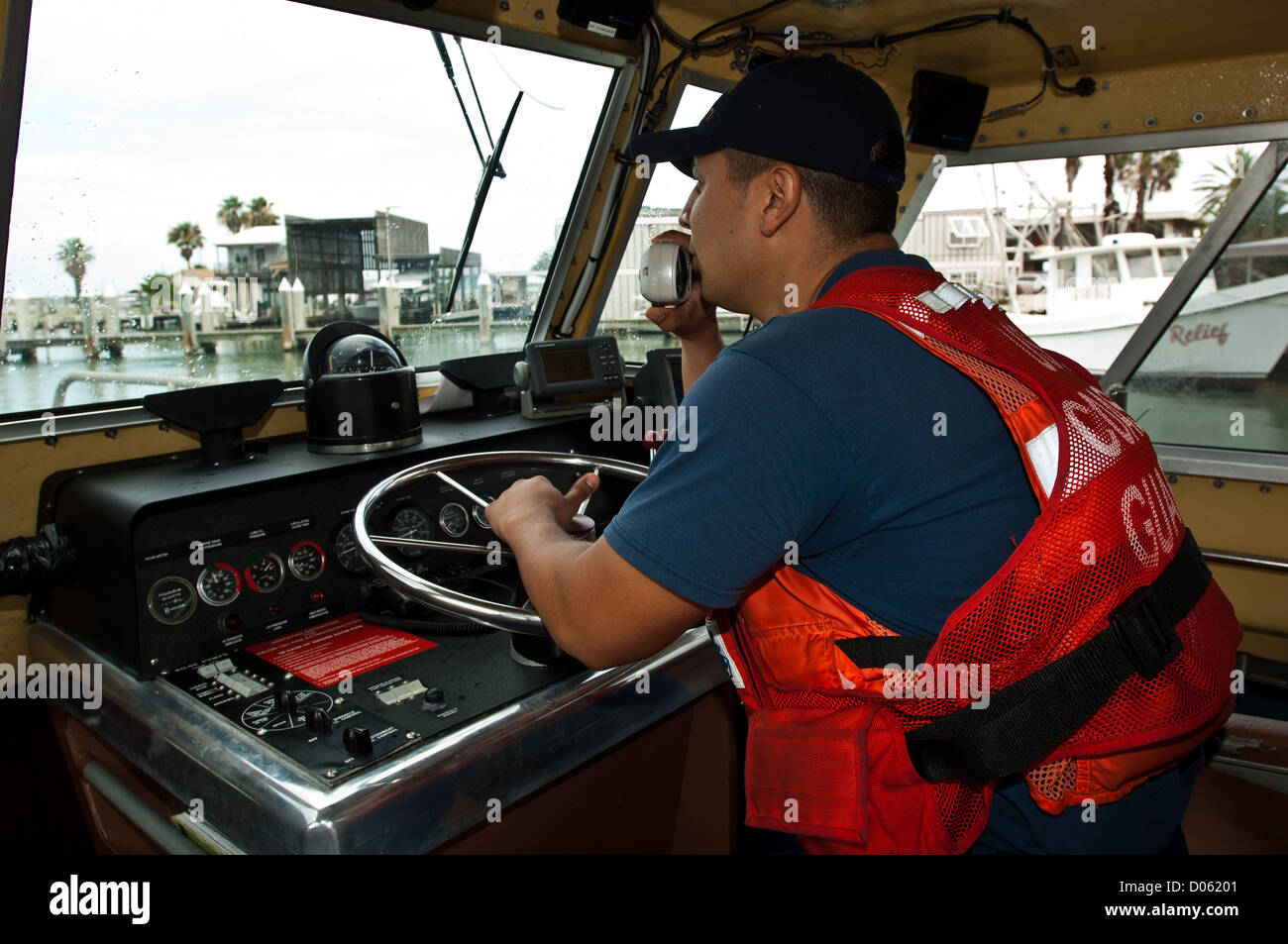 US Coast Guard Captain at the helm of his ship, Port Aransas Texas ...