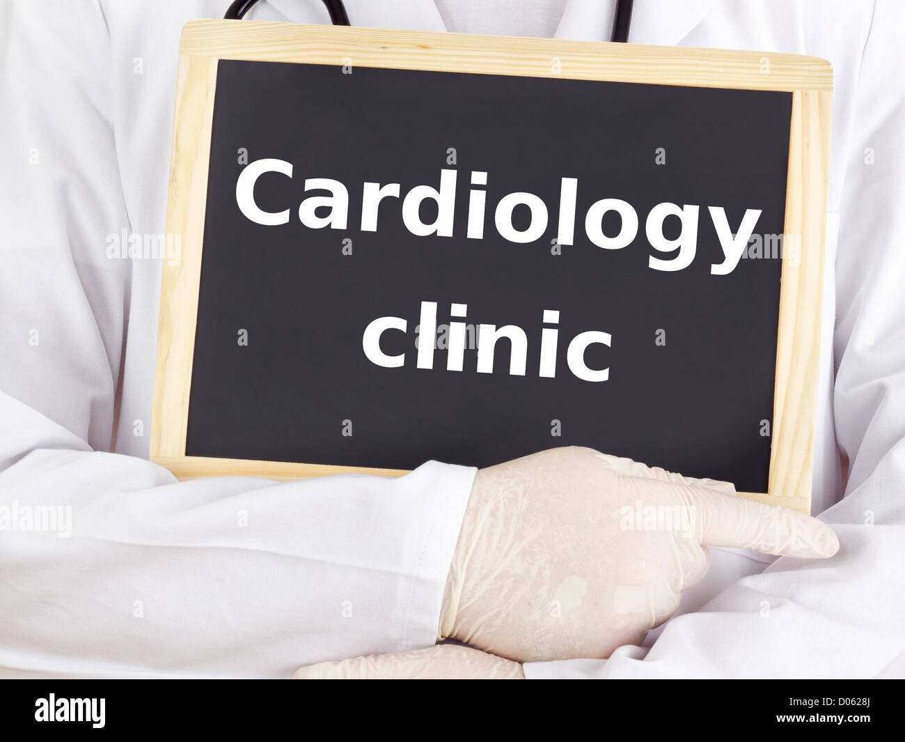 Doctor shows information: cardiology clinic Stock Photo - Alamy