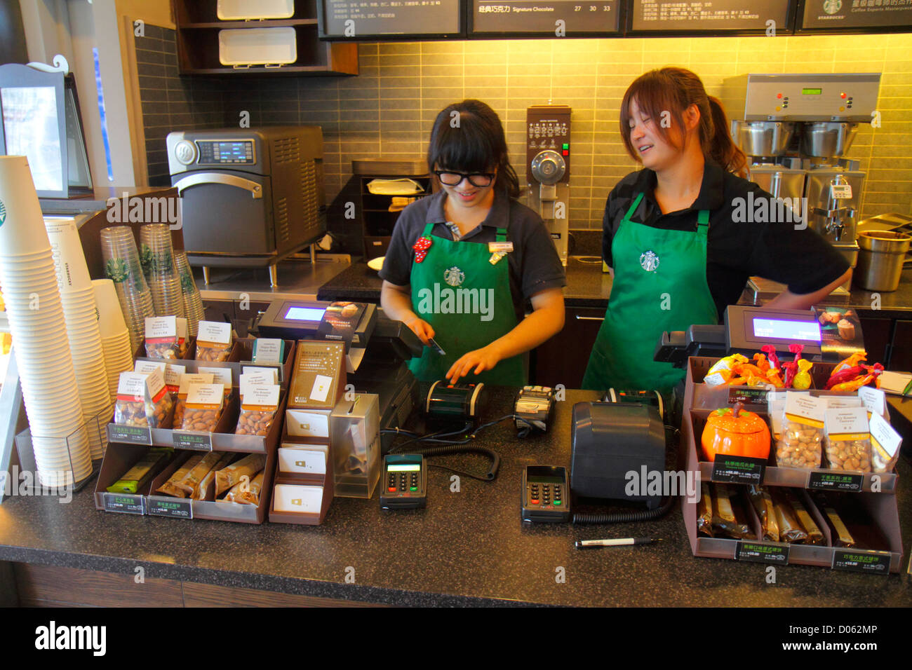 Starbucks worker hi-res stock photography and images - Alamy