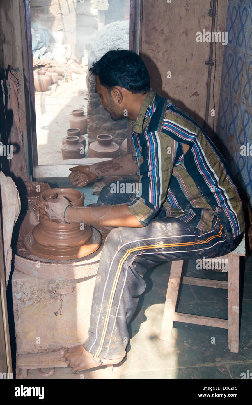 Indian man making pottery hi-res stock photography and images - Alamy