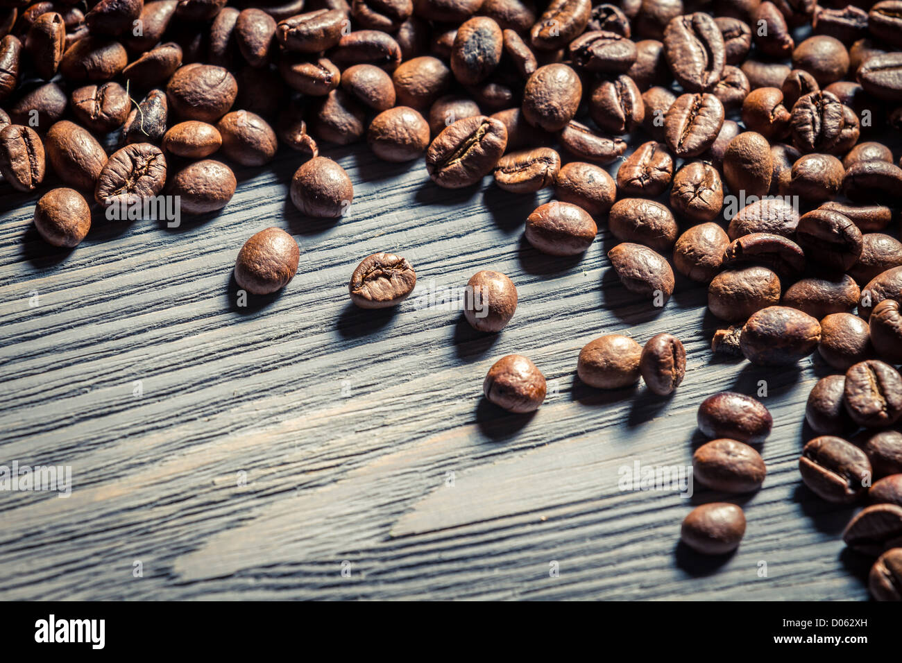 Coffee seed on wooden table background no. 1 Stock Photo - Alamy