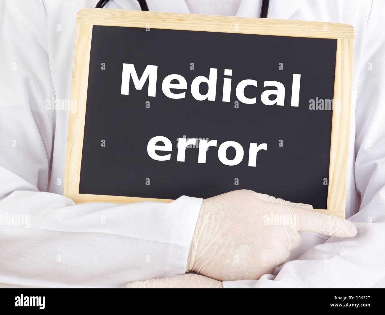 Doctor shows information: medical error Stock Photo - Alamy
