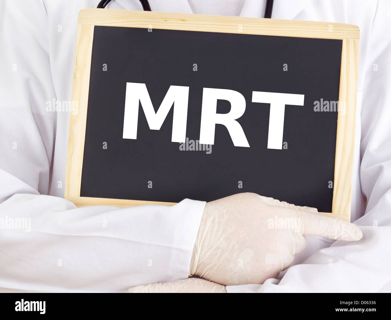 Doctor shows information on blackboard: mrt Stock Photo - Alamy