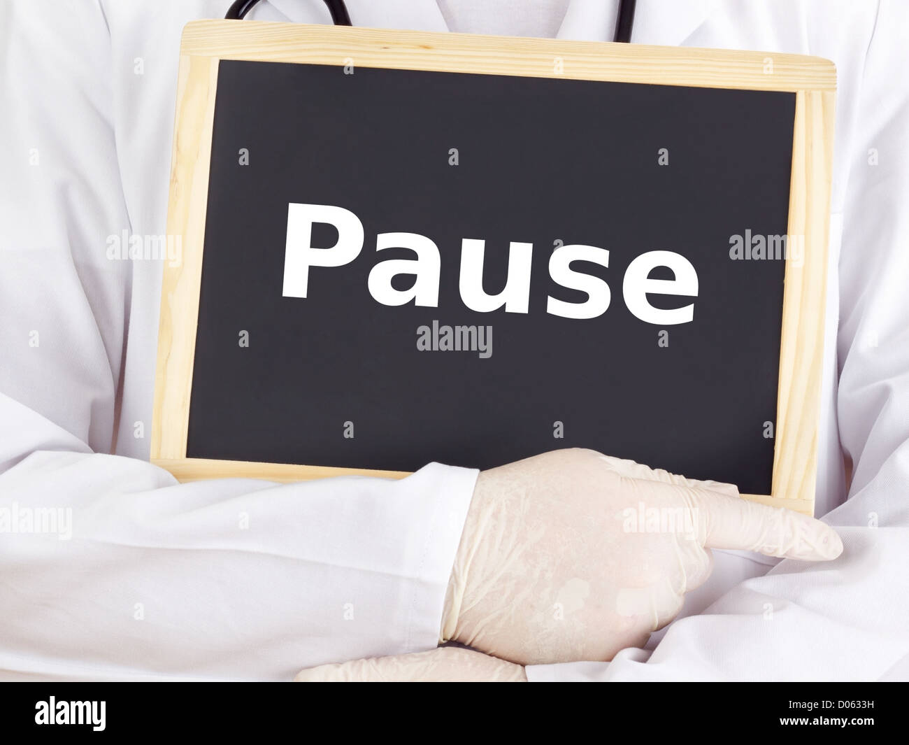 Doctor shows information on blackboard: pause Stock Photo - Alamy