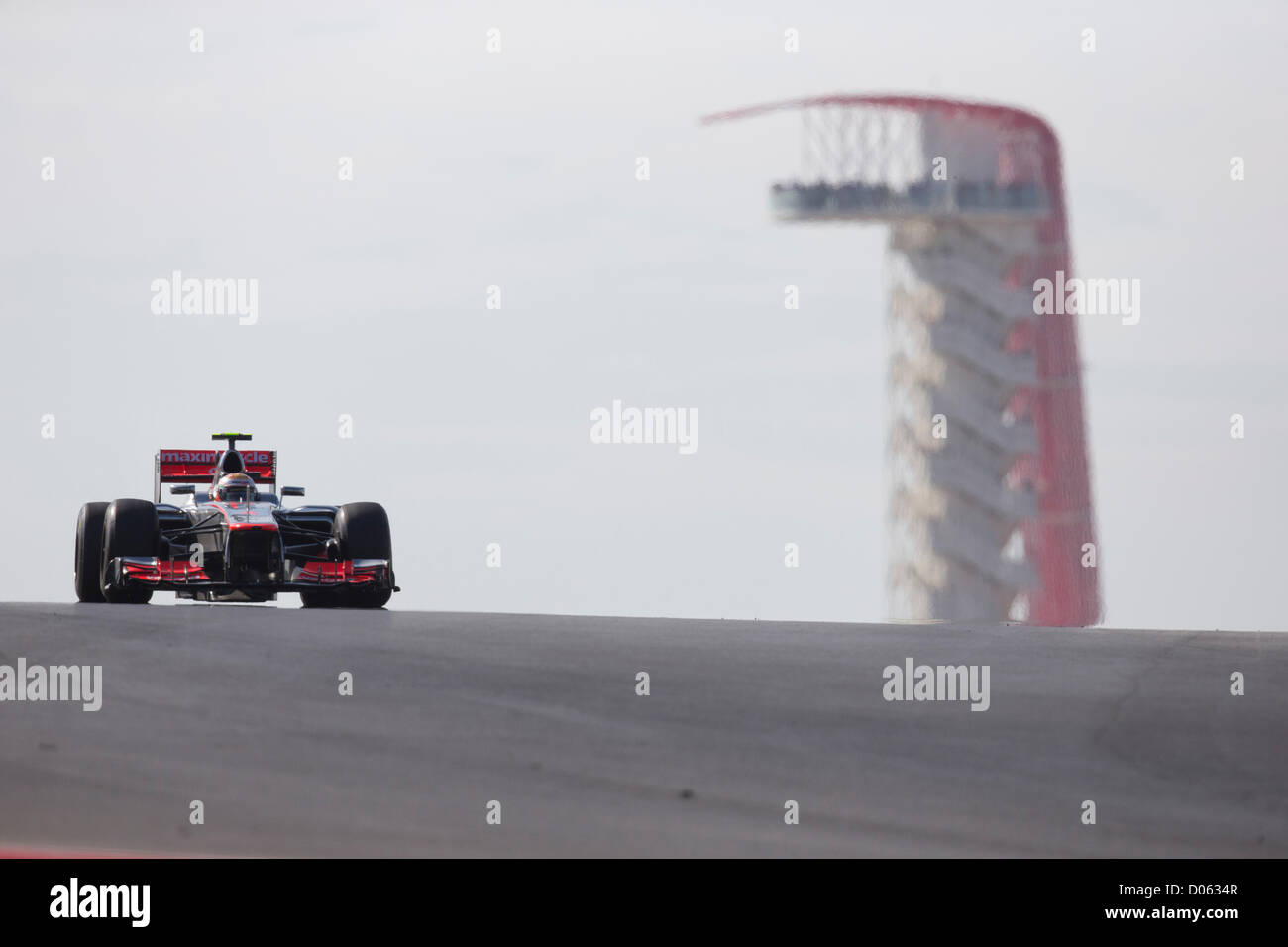 British driver Lewis Hamilton passes the observation tower during the ...