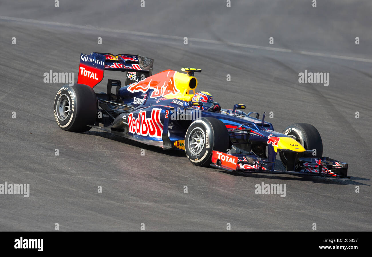 Australian F1 driver Mark Webber heads through turn 1 at the inaugural ...