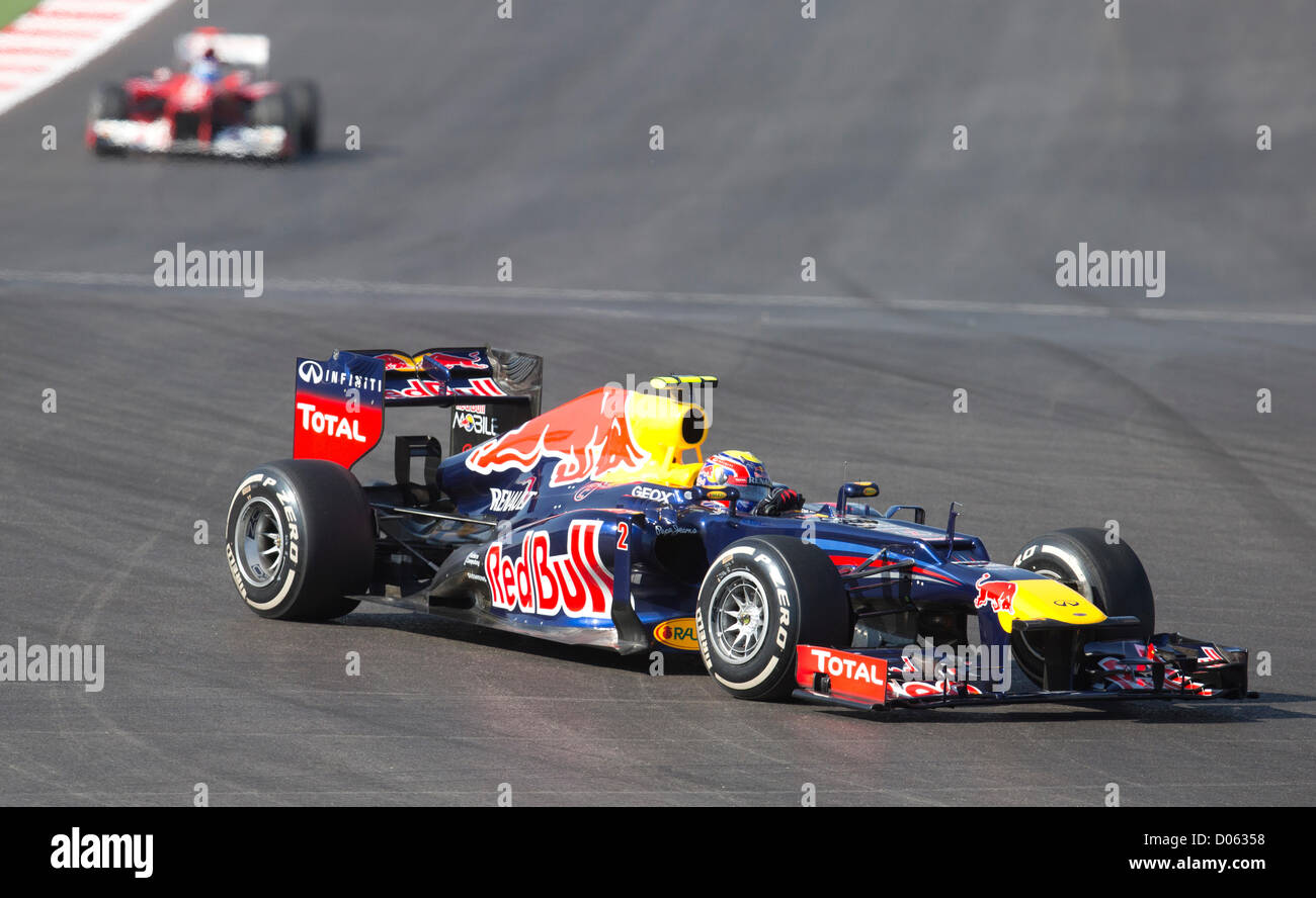 Australian F1 driver Mark Webber heads through turn 1 at the inaugural ...