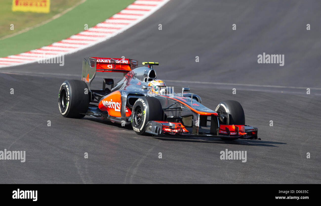 British F1 driver Lewis Hamilton heads through turn 1 at the inaugural ...