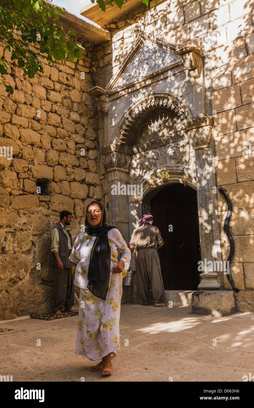 Woman at the main temple of Lalish, the holiest place in the world for ...