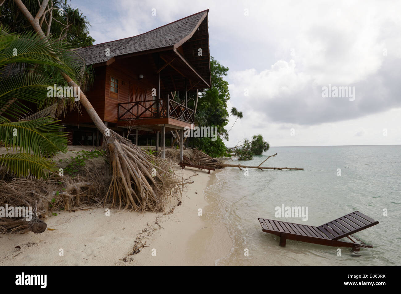 Luxury huts and sunbeds almost lost to the sea, Lankayan Island, Borneo ...