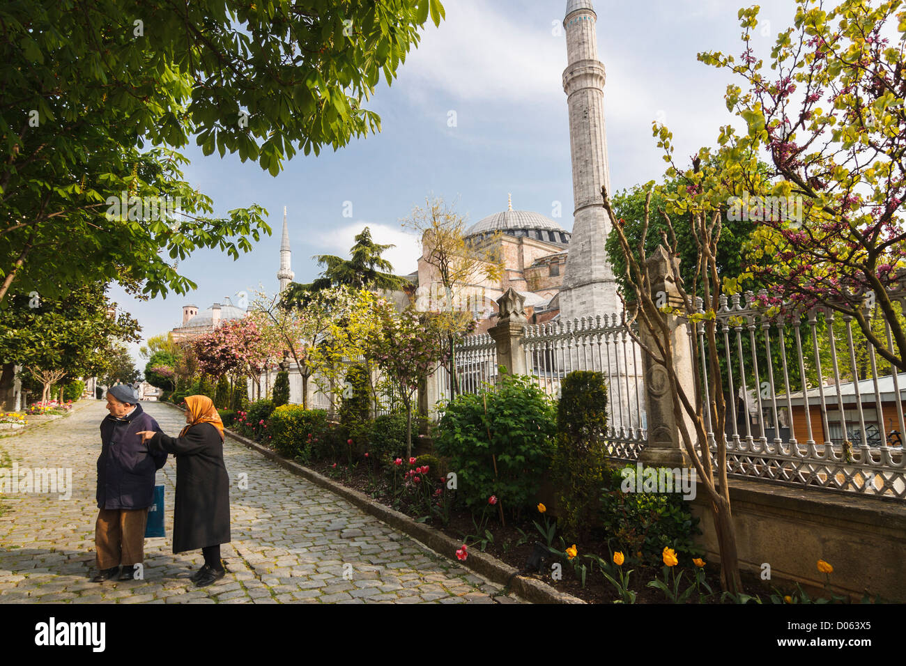 Old Turkish people and side view of Hagia Sophia. Istanbul, Turkey ...