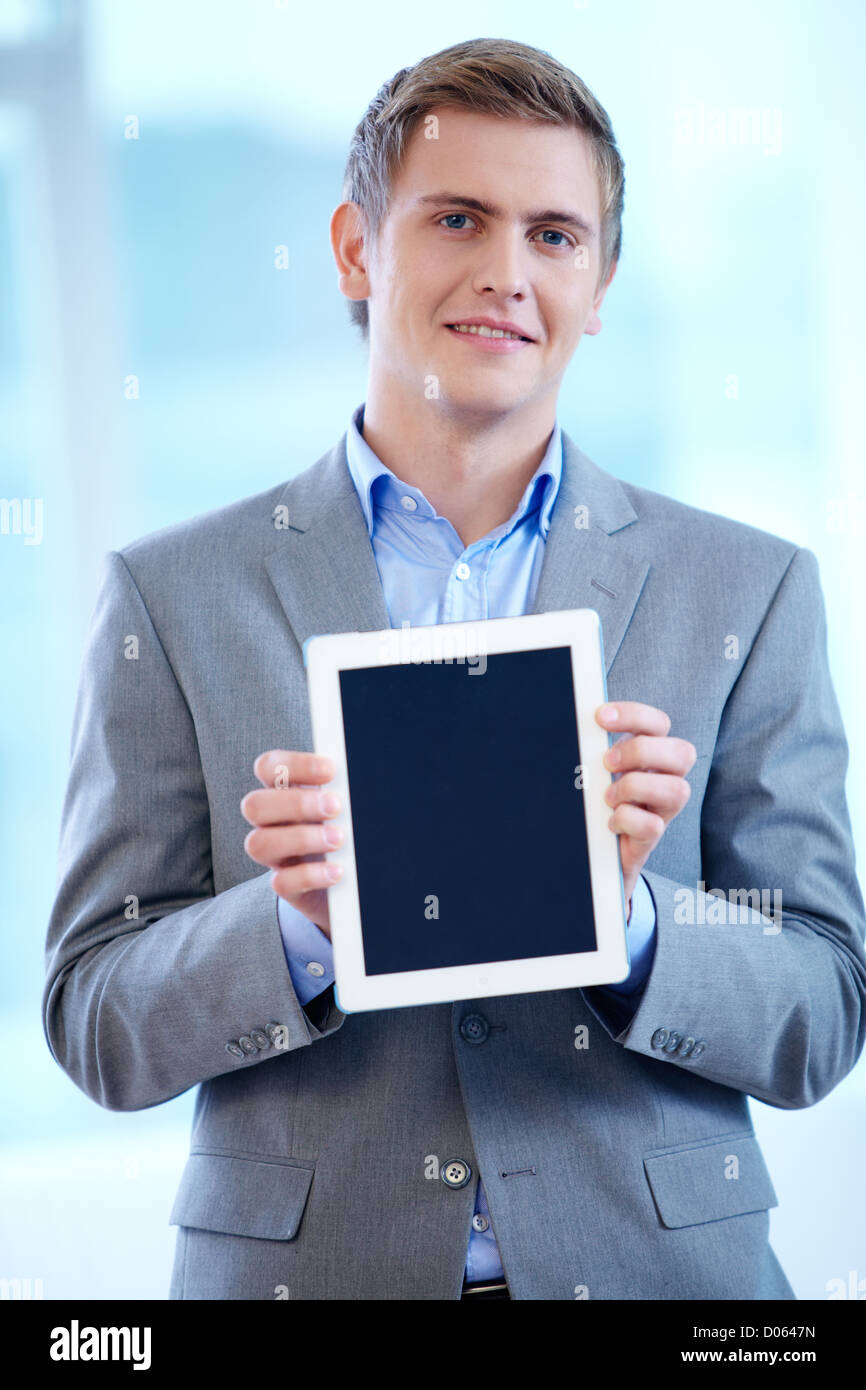Portrait of cheerful businessman with touchpad looking at camera Stock ...