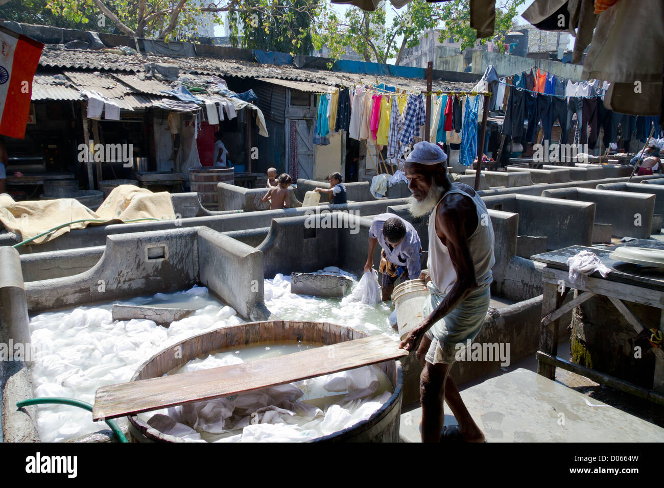 Launderer at Work in the open Air Laundry of Dhobi Ghat in Mumbai ...
