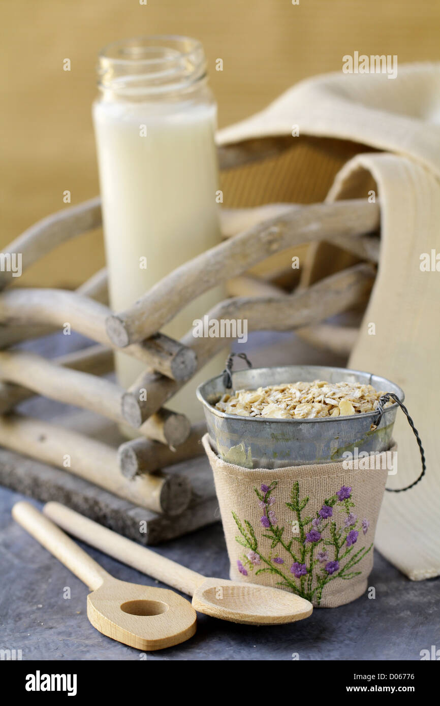 oat groats with a bottle of milk, healthy rustic breakfast Stock Photo ...