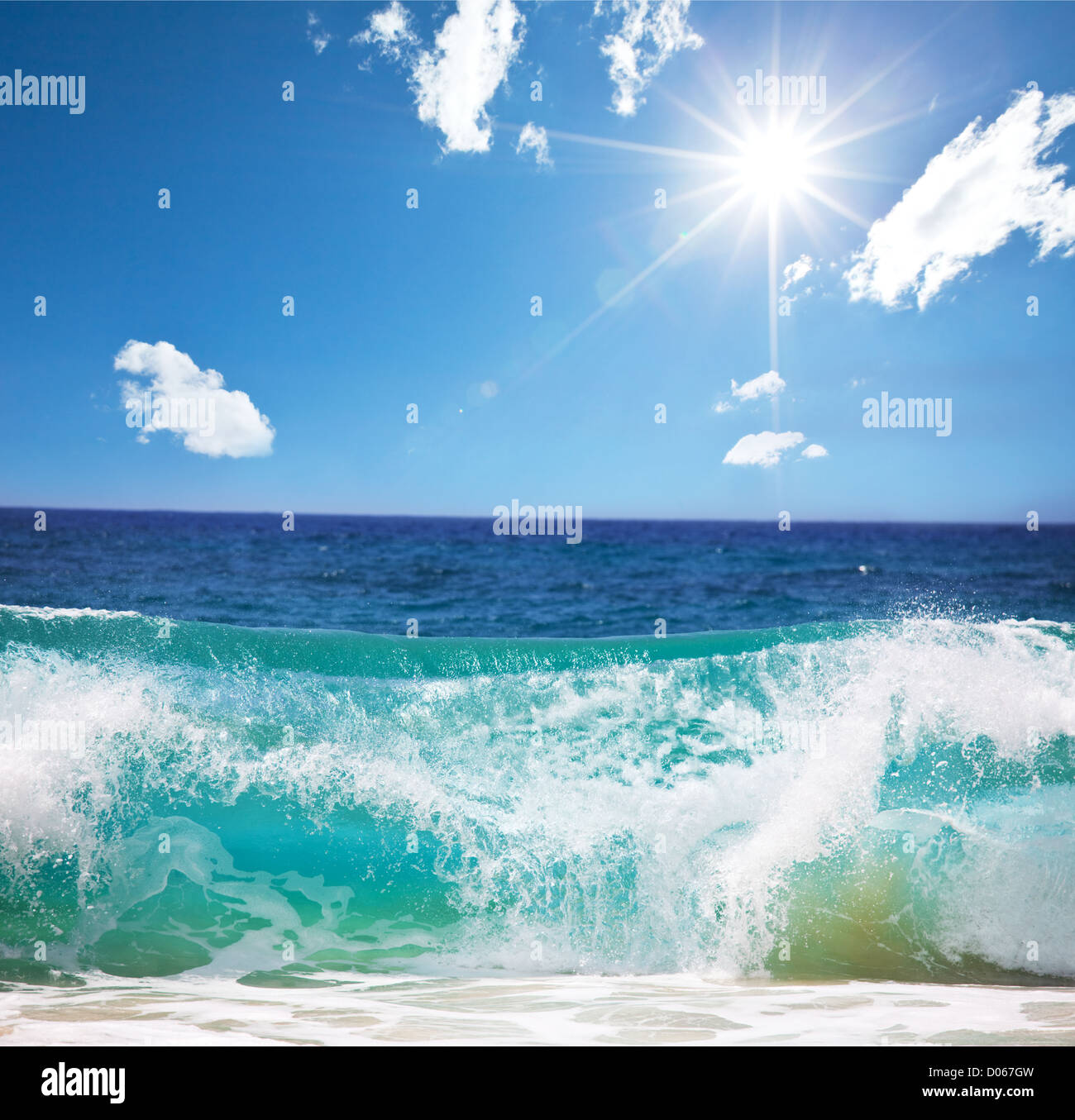 Wave on the beach Stock Photo - Alamy