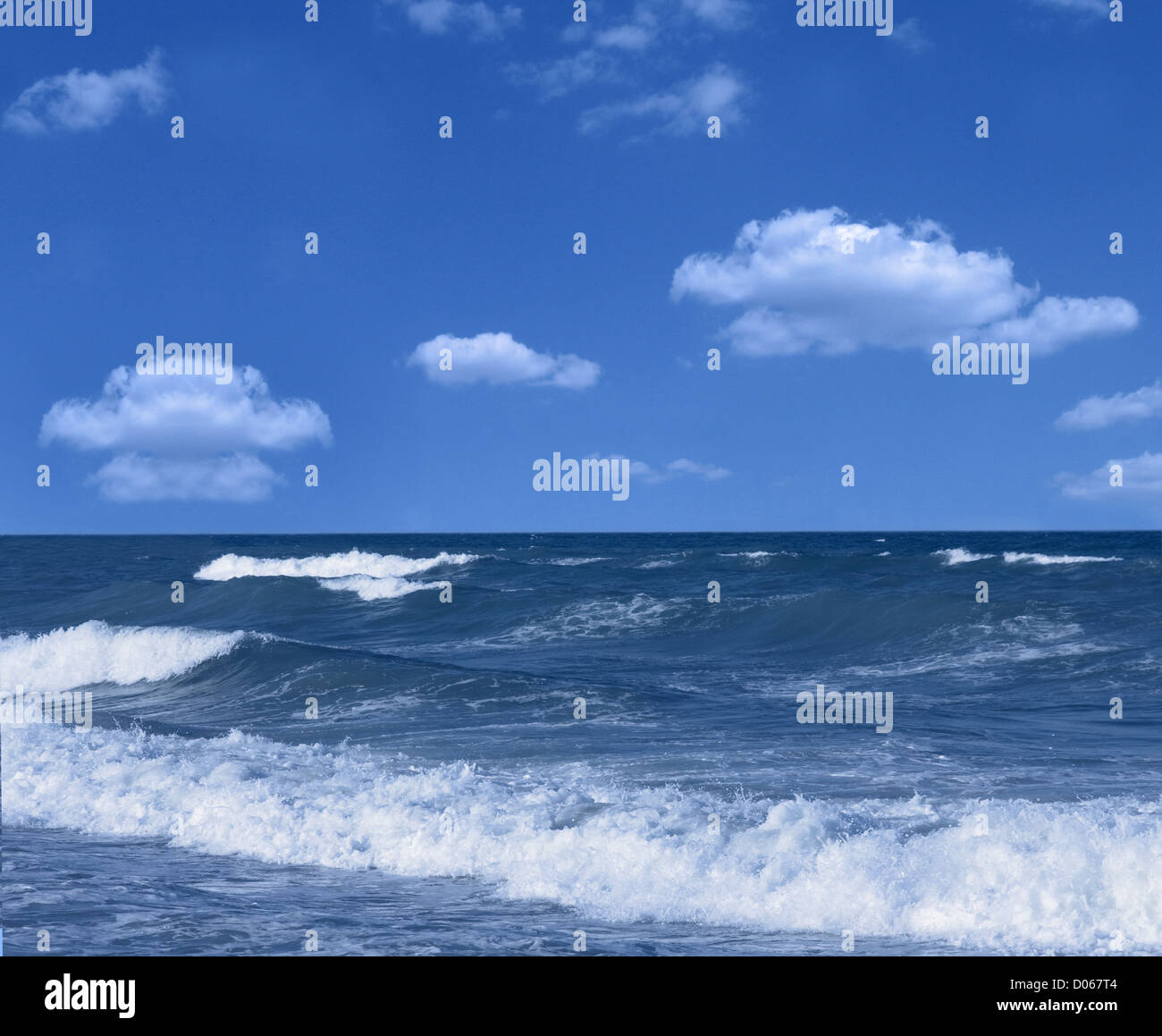 Blue sea with waves and sky Stock Photo - Alamy