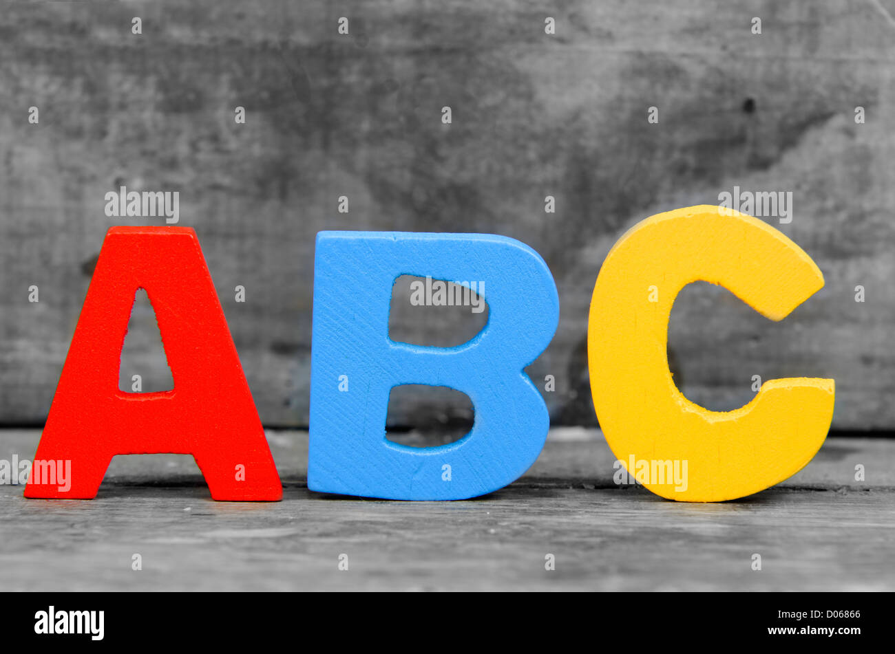 wooden letters on wooden background Stock Photo - Alamy