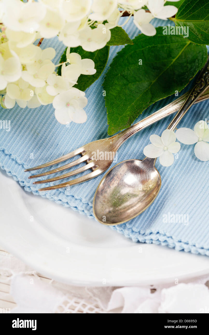 place setting with hydrangea flower Stock Photo - Alamy