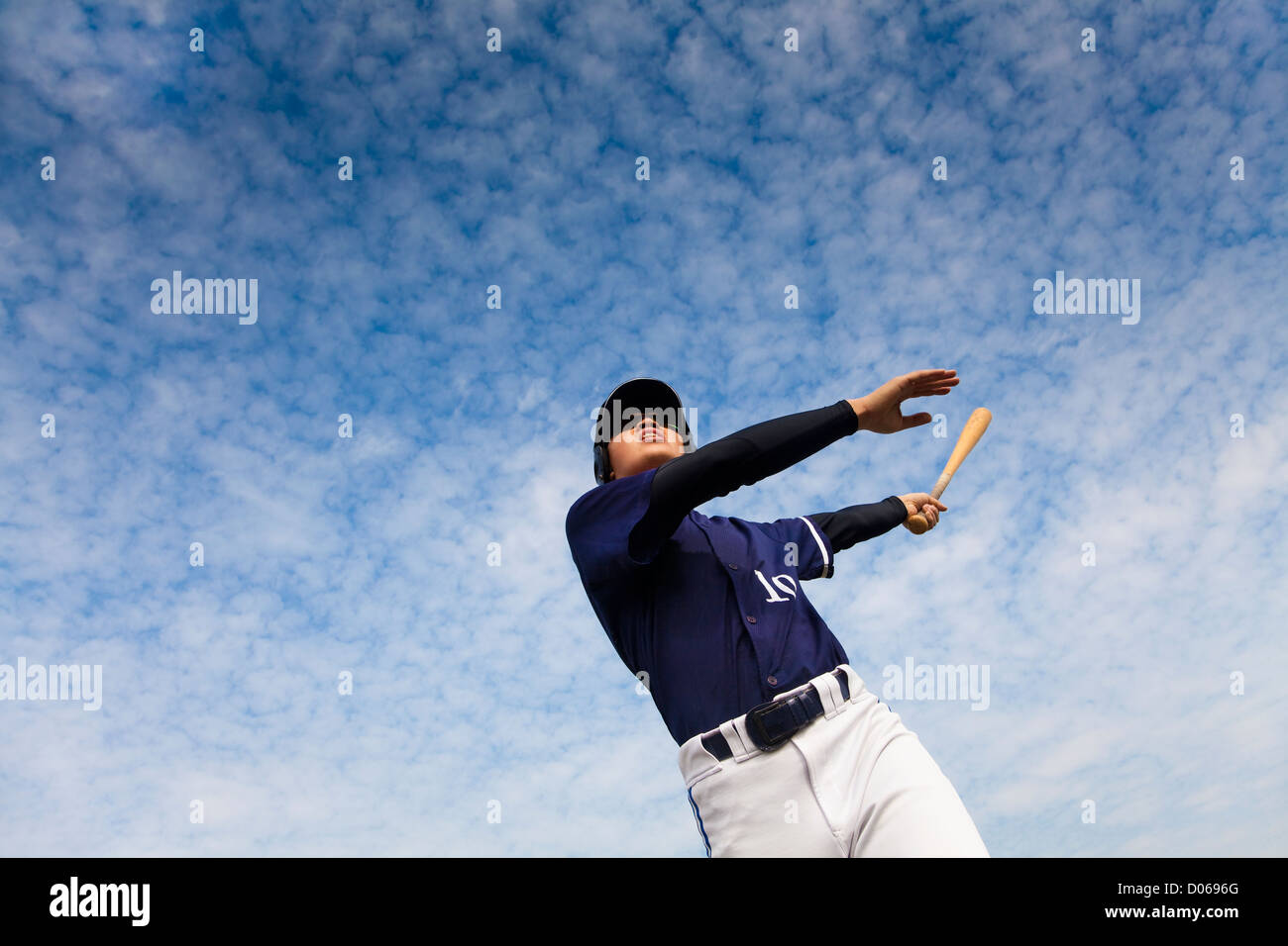 young baseball player taking a swing Stock Photo - Alamy