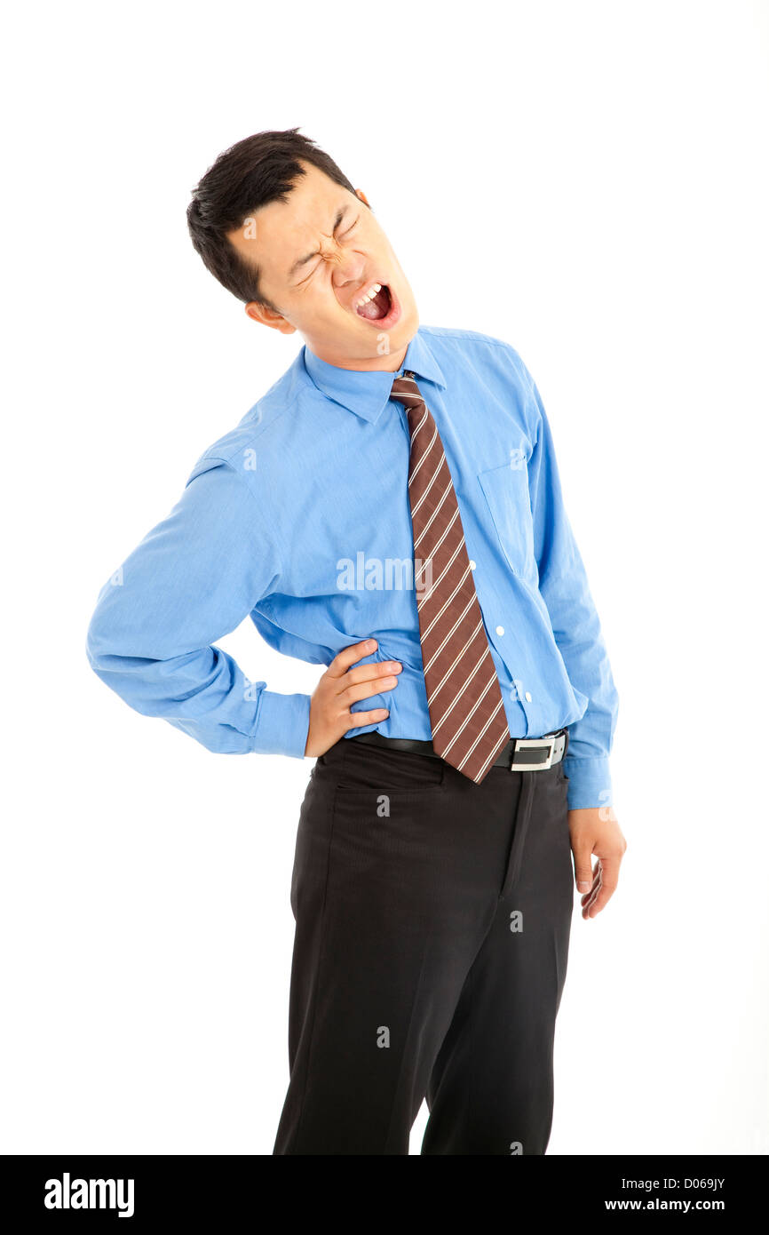 Young businessman with back pain and isolated on white background Stock ...