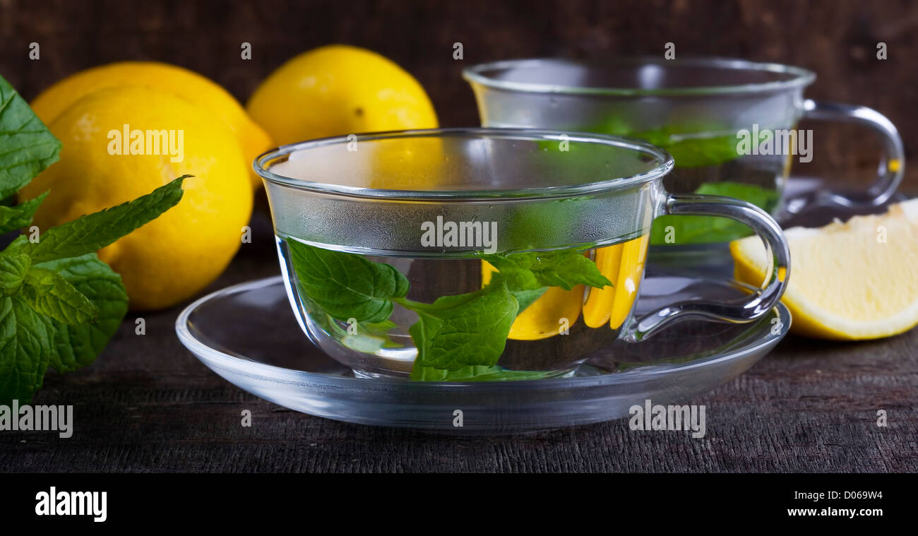 Mint tea with lemon Stock Photo - Alamy