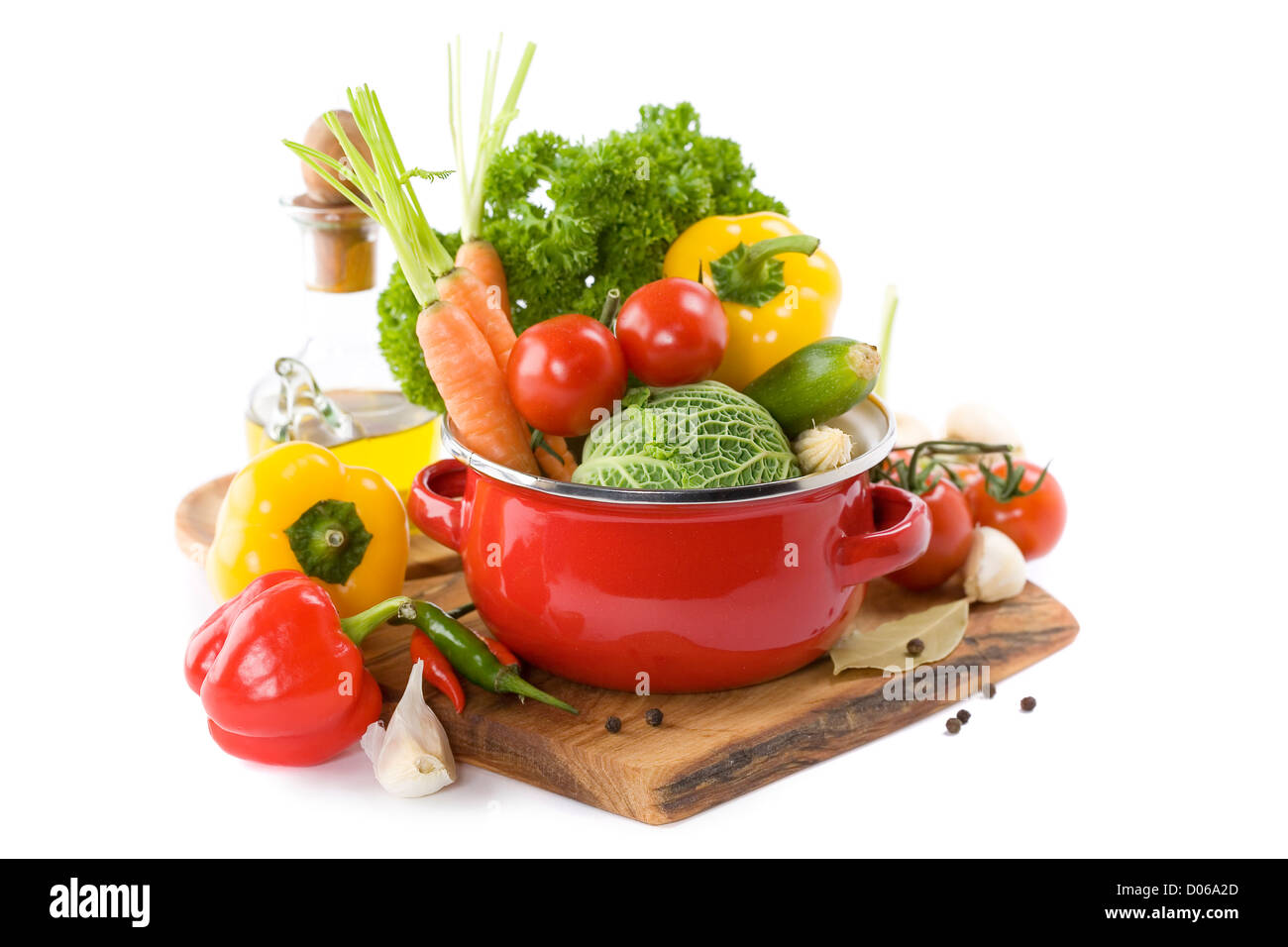 Ratatouille or soup vegetables in a cooking pot over white Stock Photo ...