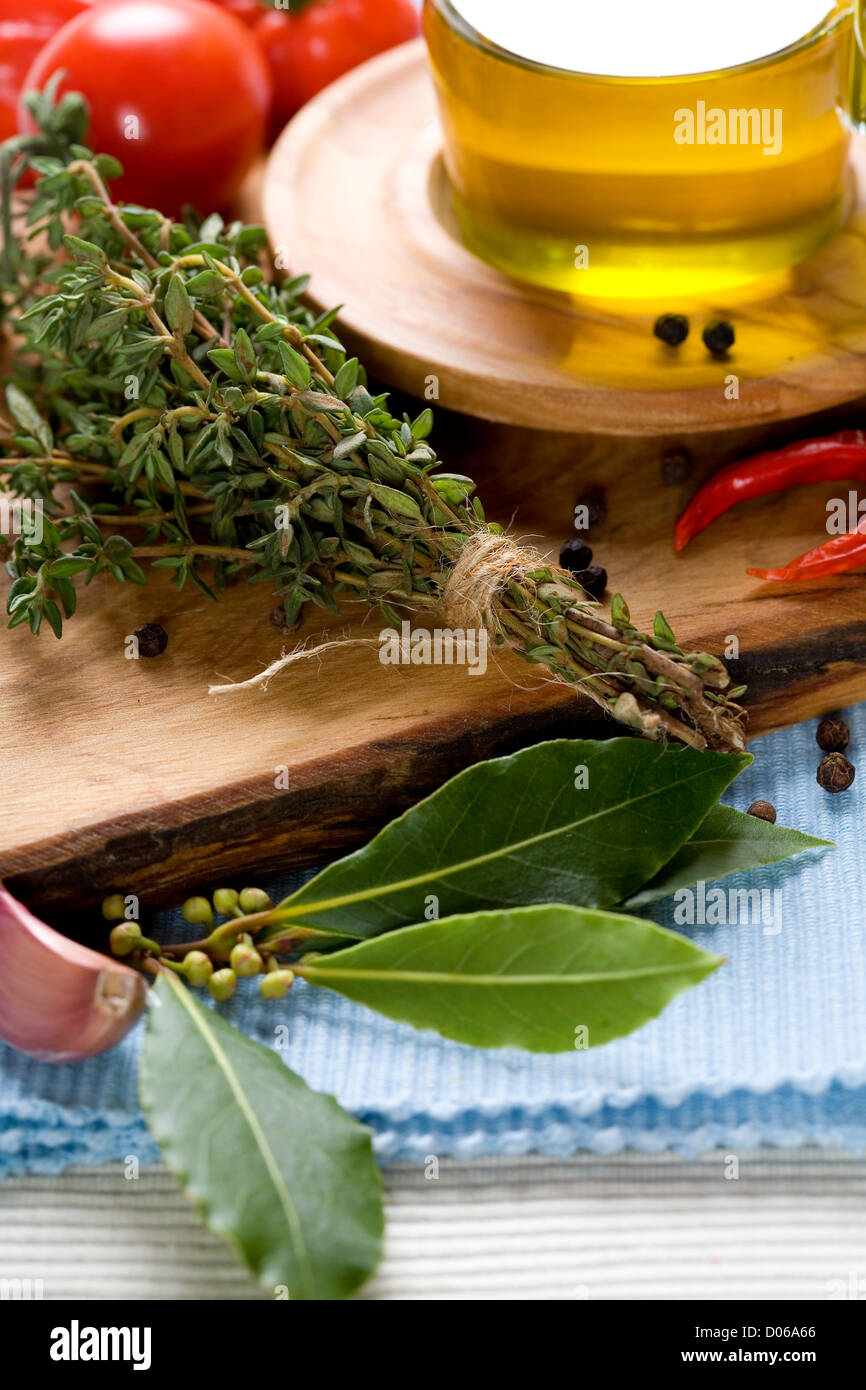 Bottle of Olive oil and condiments Stock Photo - Alamy