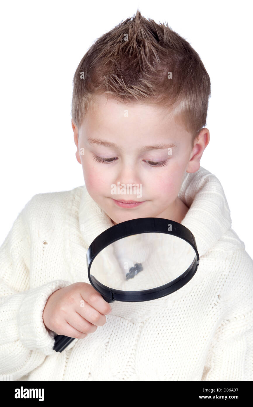 Adorable child with a magnifying glass isolated on white background ...