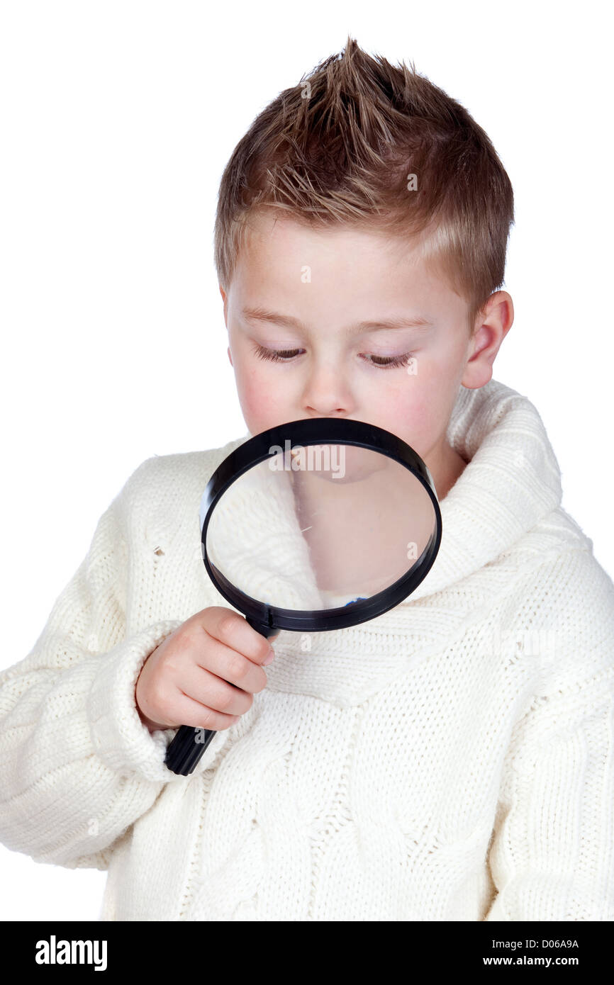 Adorable child with a magnifying glass isolated on white background ...