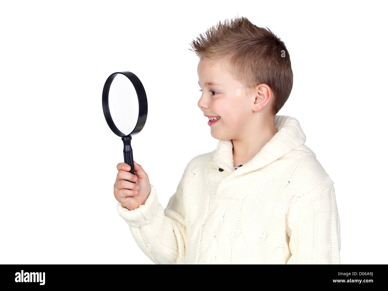 Adorable child with a magnifying glass isolated on white background ...