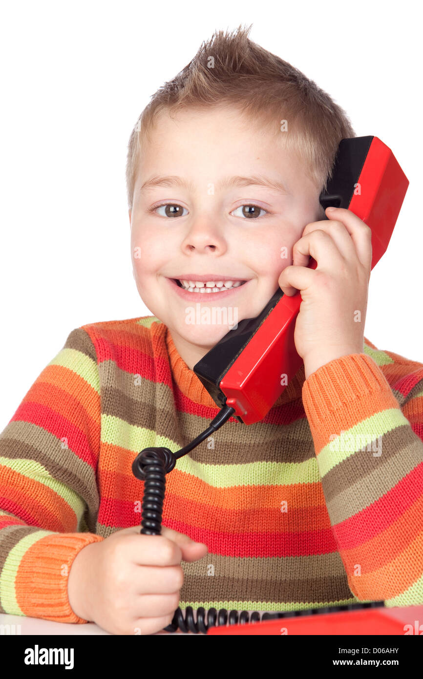 Adorable child with a tradicional telephone isolated over white Stock ...