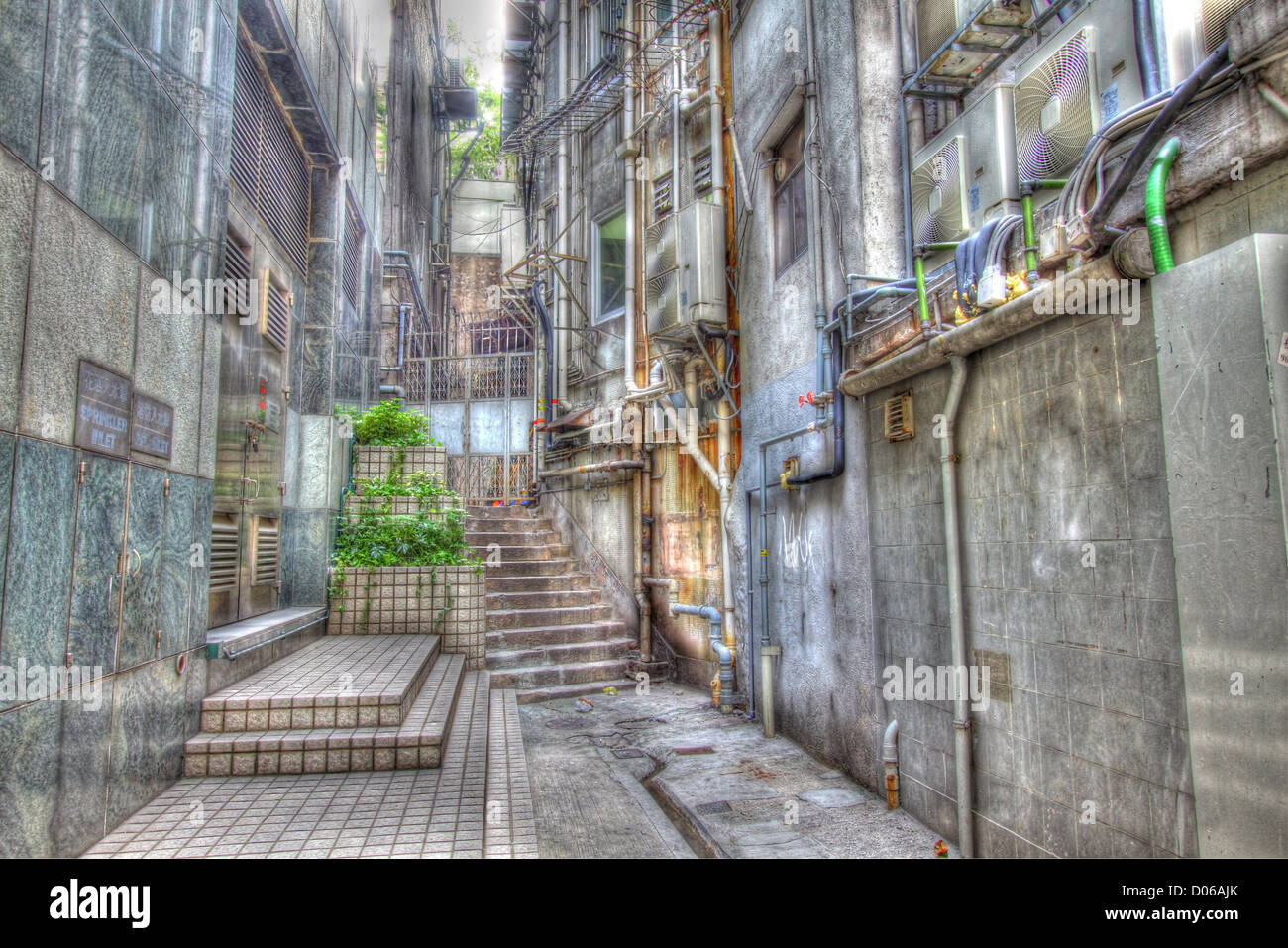 Alley in an old street, HDR image Stock Photo - Alamy