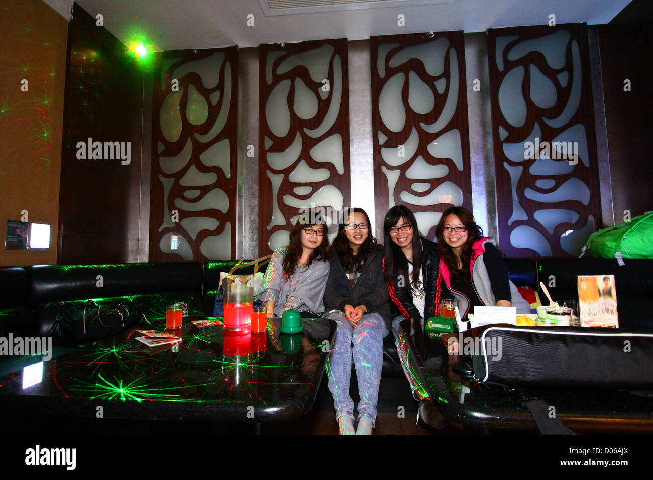 Asian friends in clubbing Stock Photo - Alamy